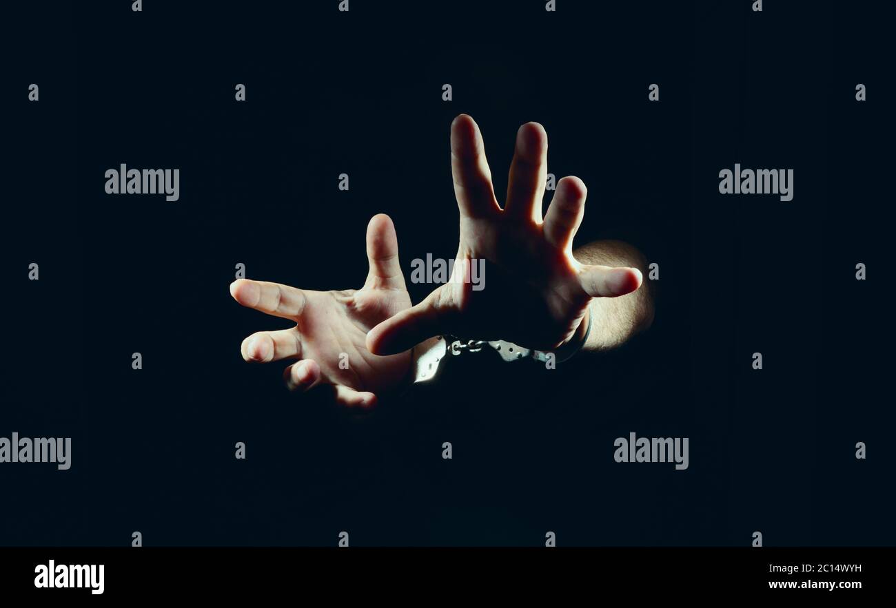 Woman handcuff hi-res stock photography and images - Alamy