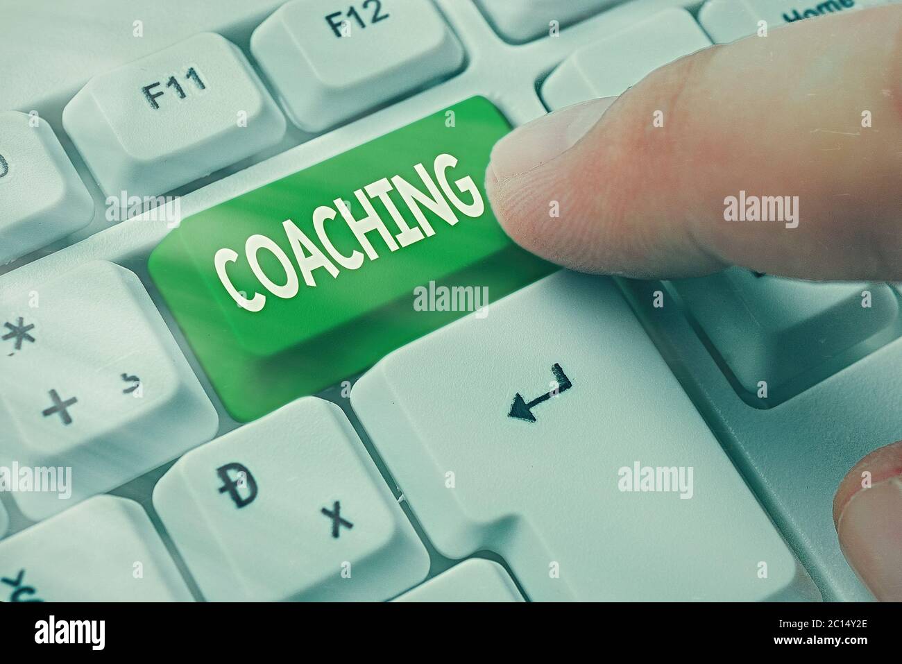 Text sign showing Coaching. Business photo text unlocking an ...