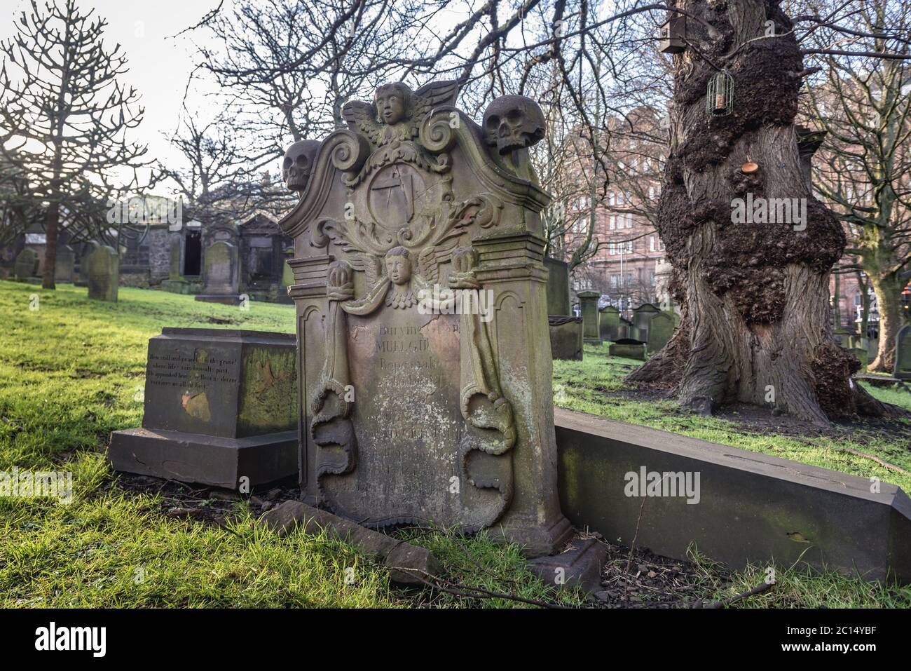 Old graves on a cemetery of Parish Church of St Cuthbert in Edinburgh ...