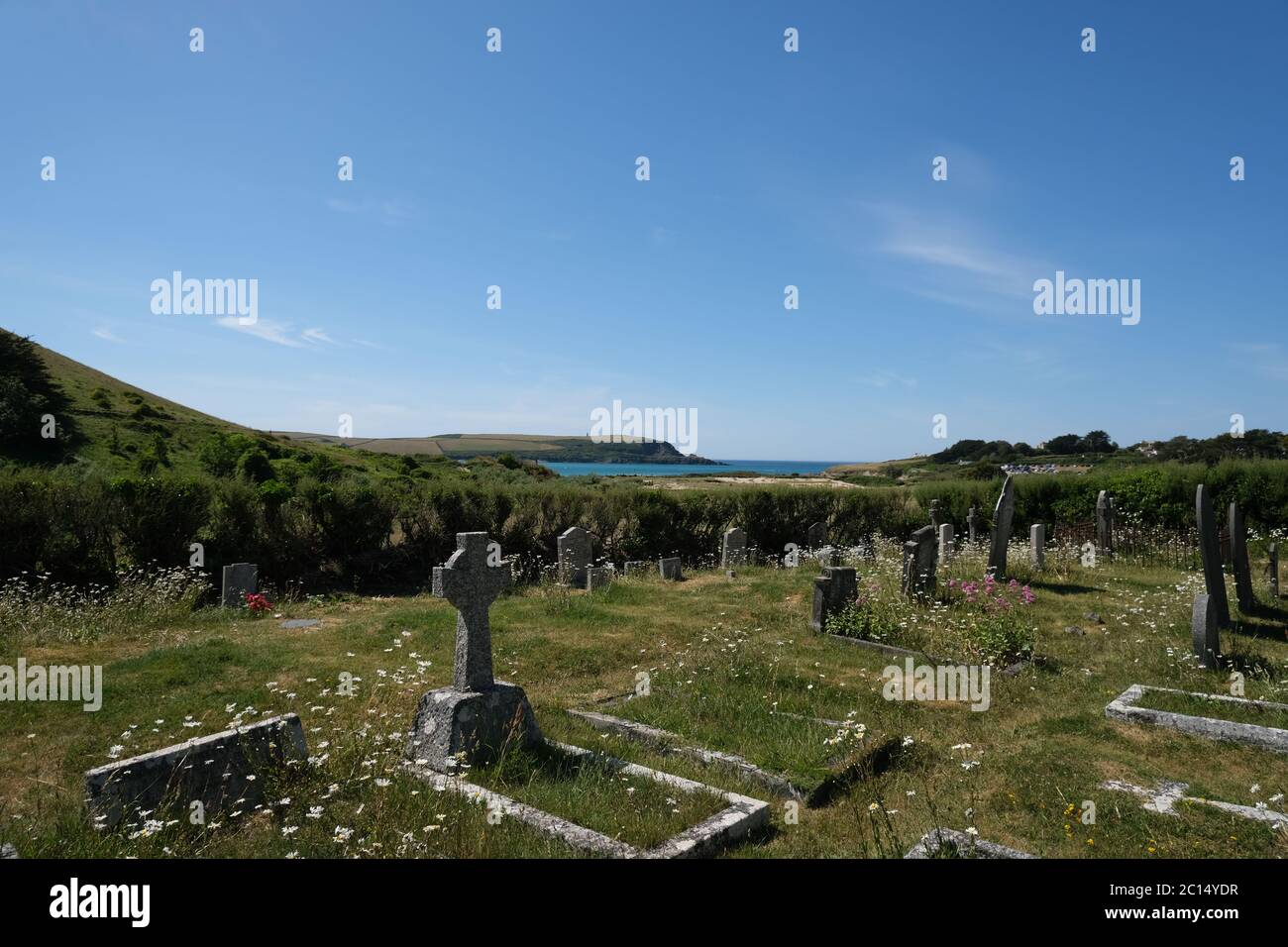Outdoor view of the graveyard at St Enodoc Church in Cornwall looking ...