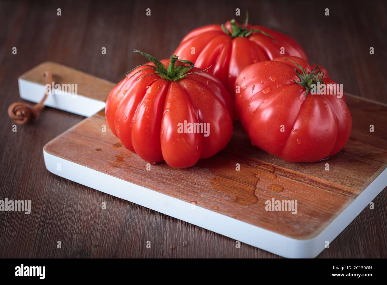 Fresh raw tomatoes Stock Photo - Alamy