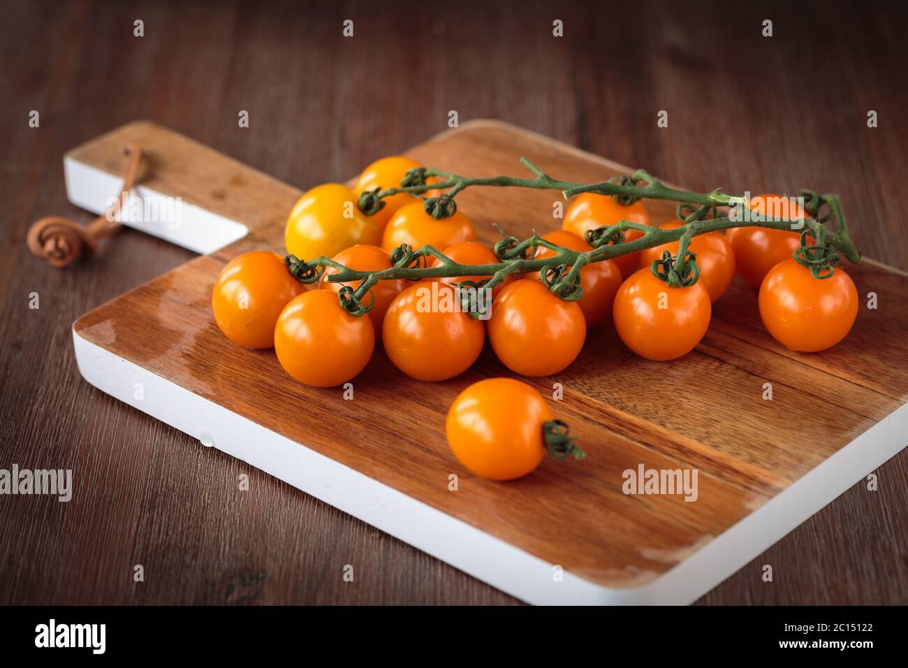Fresh orange cherry tomatoes Stock Photo - Alamy