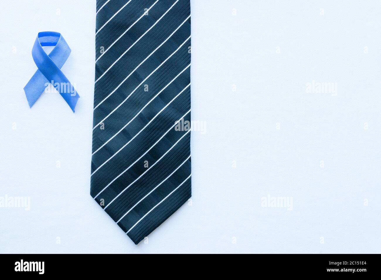 blue ribbon and tie the symbol of prostate cancer awareness Stock Photo ...