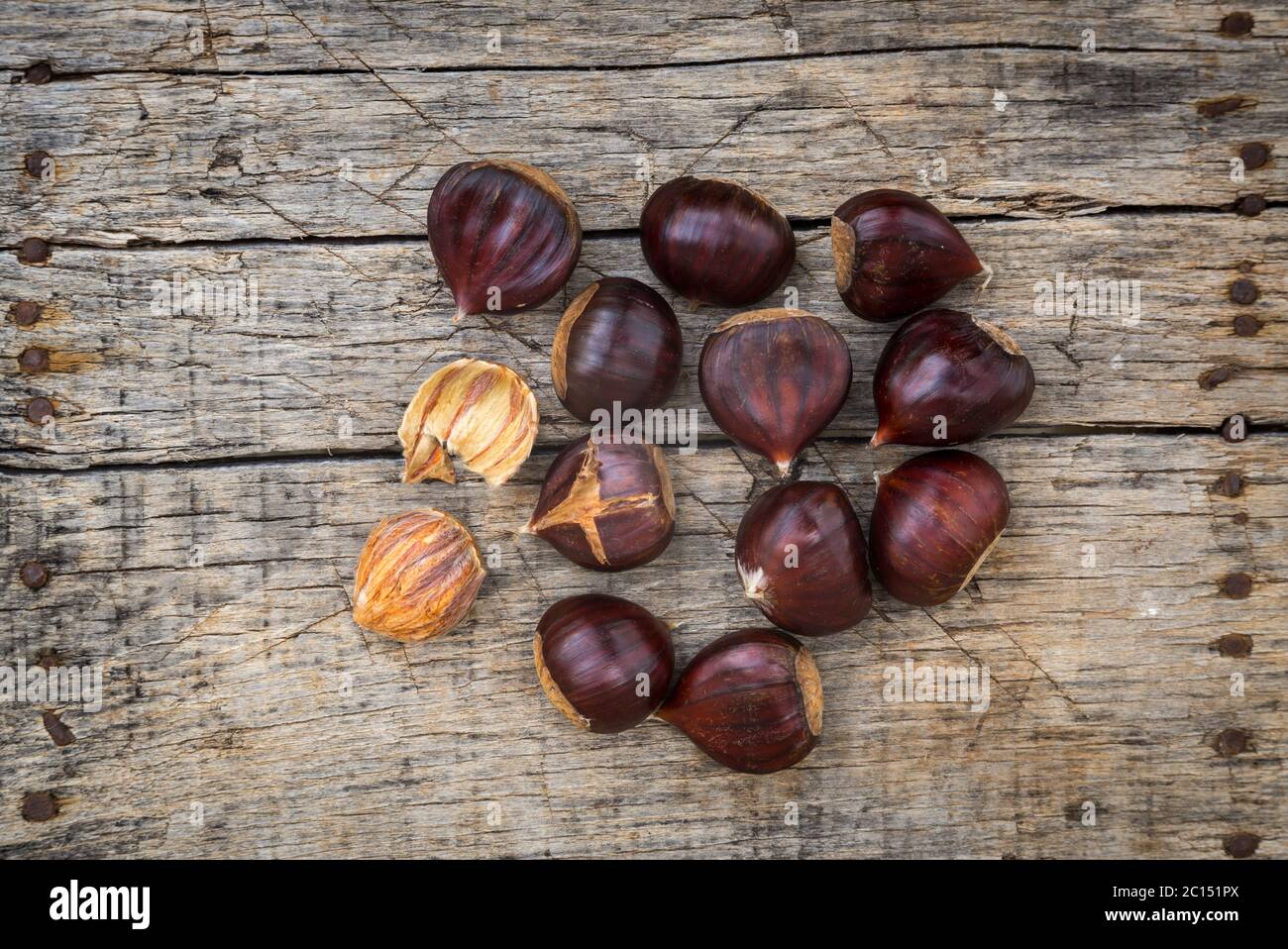 Fresh raw chestnuts Stock Photo - Alamy