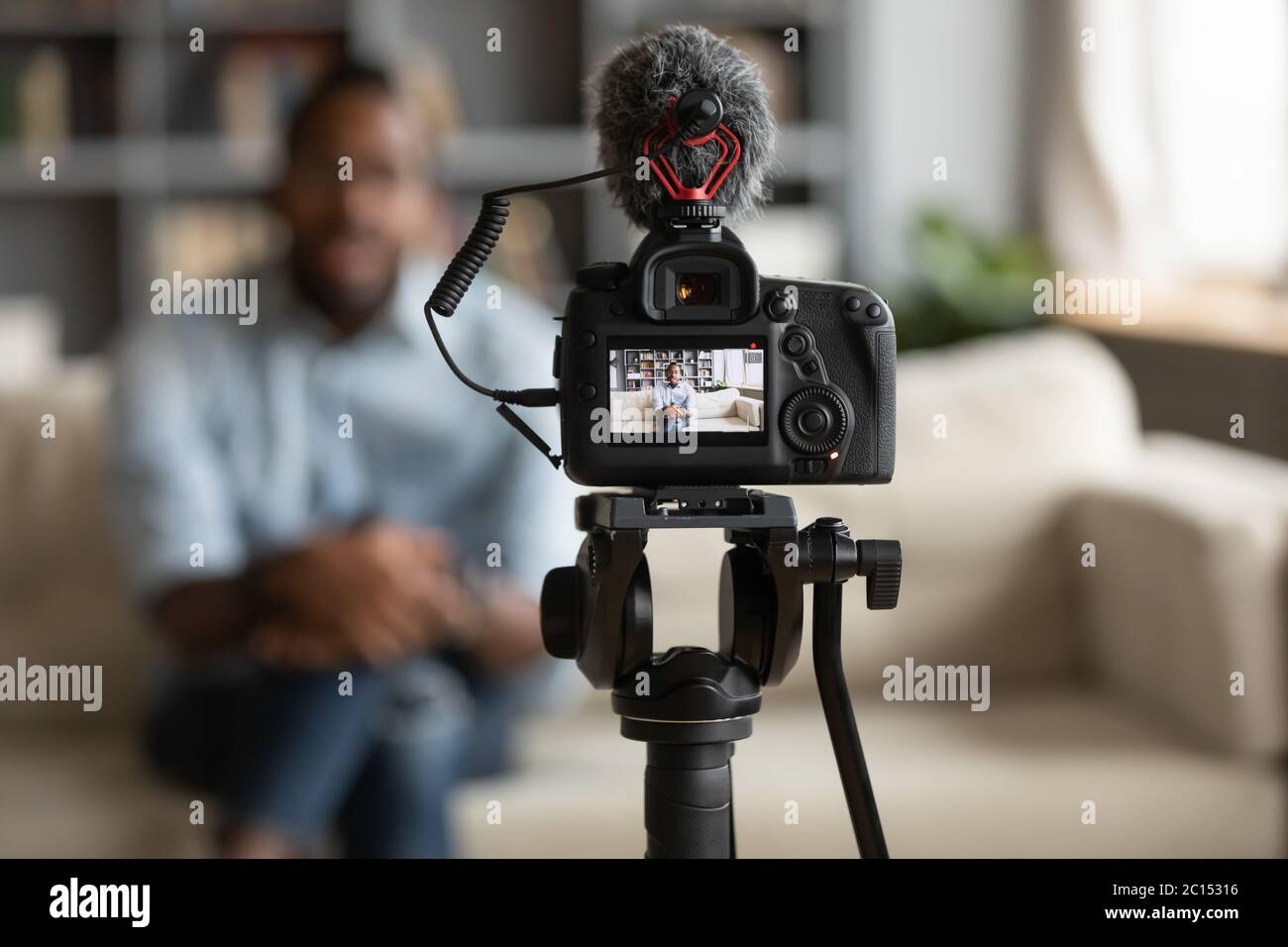African man recording new vlog, closeup view digital camera screen ...