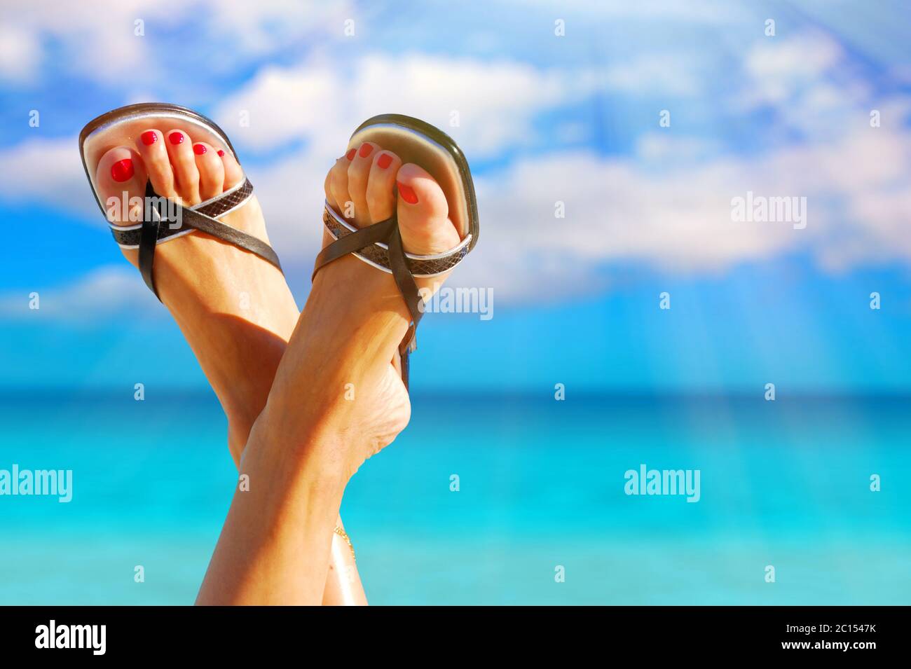Crossed feet hi-res stock photography and images - Alamy