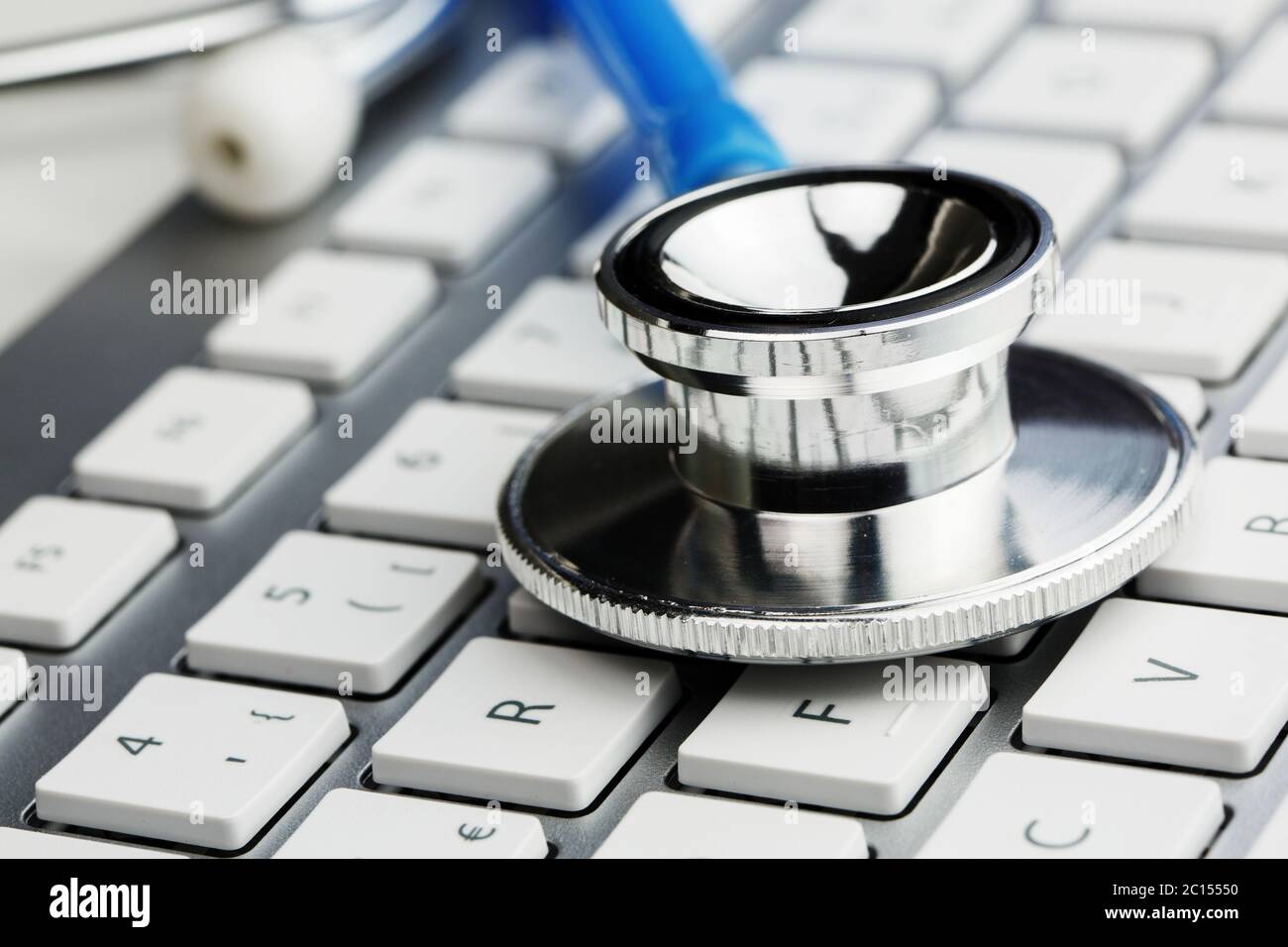 A medical stethoscope on keyboard Stock Photo - Alamy