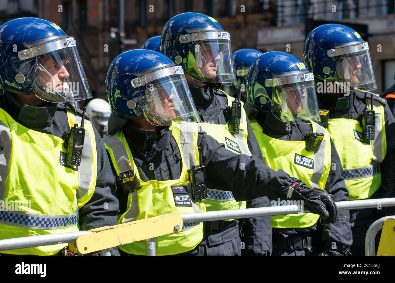 Riot police in Whitehall behind barriers, preventing Britain First far ...