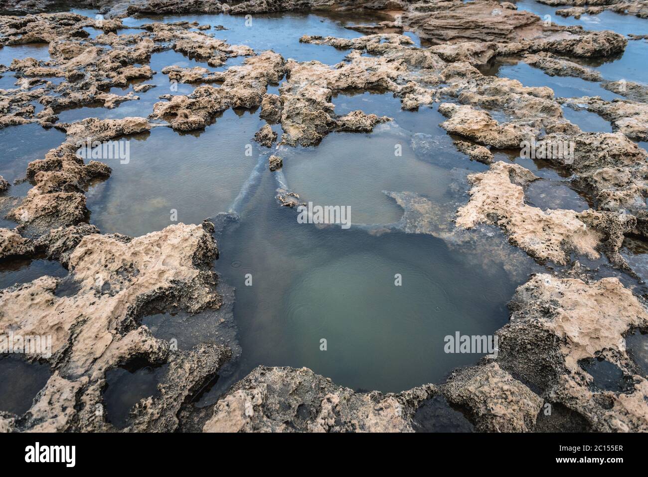 Rocky coast in port of Batroun city in northern Lebanon and one of the ...