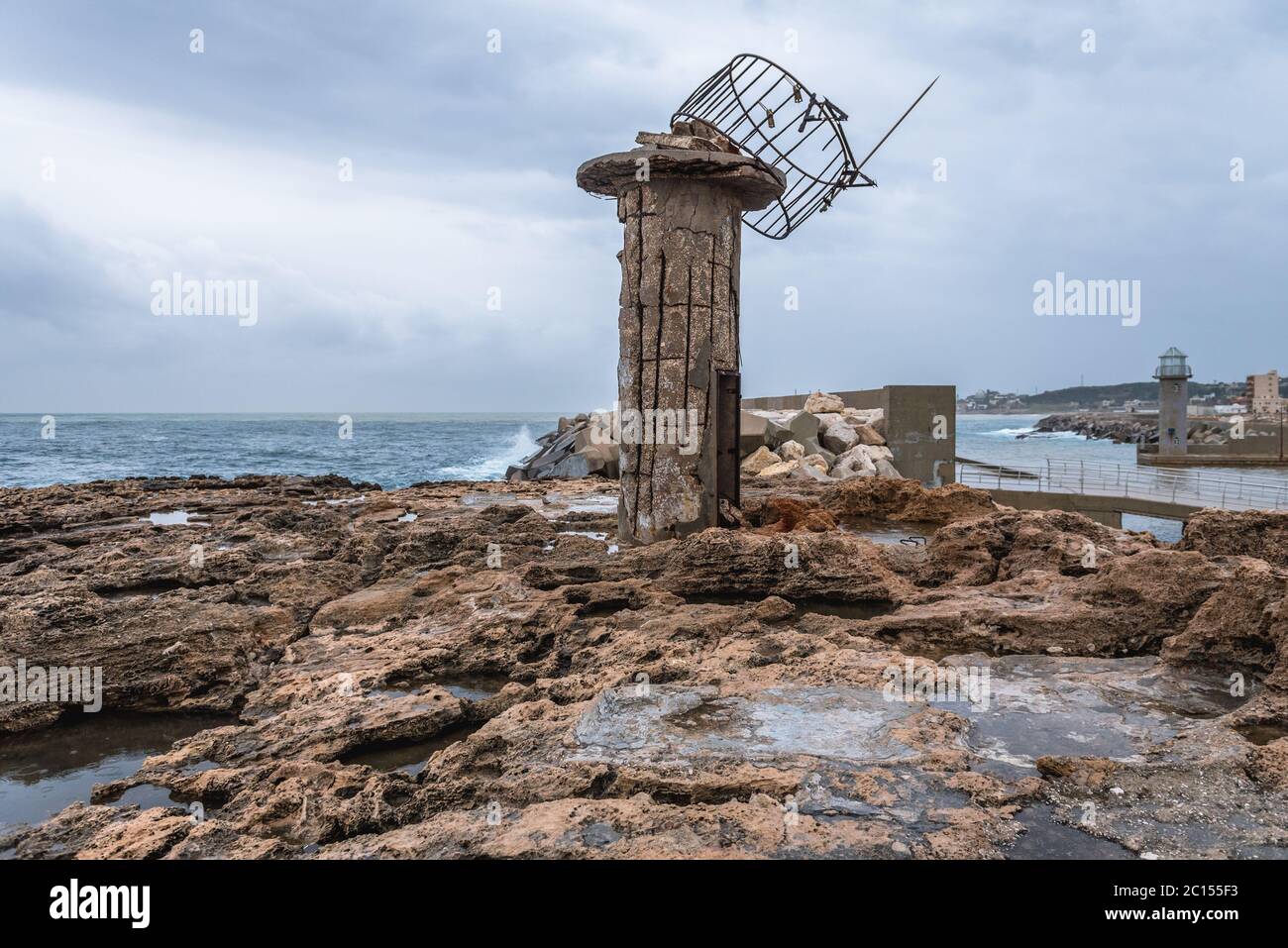 Old lighthouse in port of Batroun city in northern Lebanon and one of ...