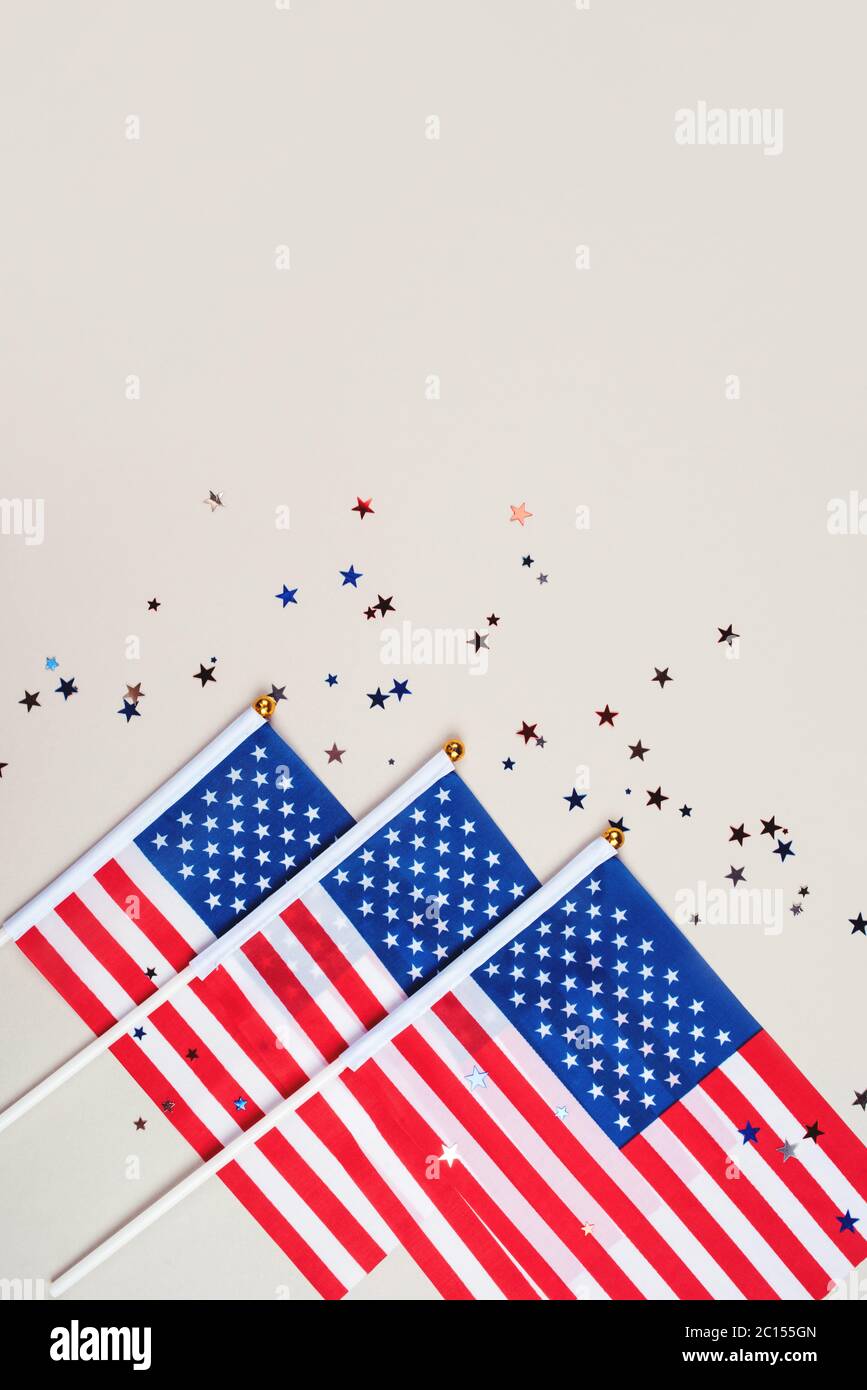 Festive background with US flags and confetti Stock Photo - Alamy