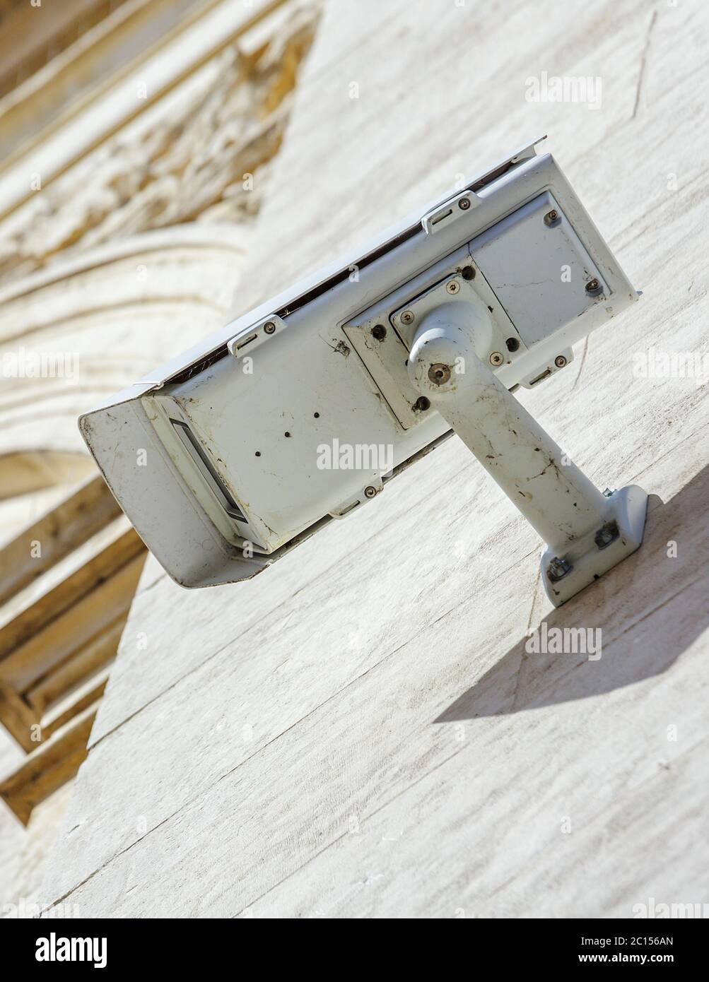 security CCTV camera or surveillance system fixed on old construction ...