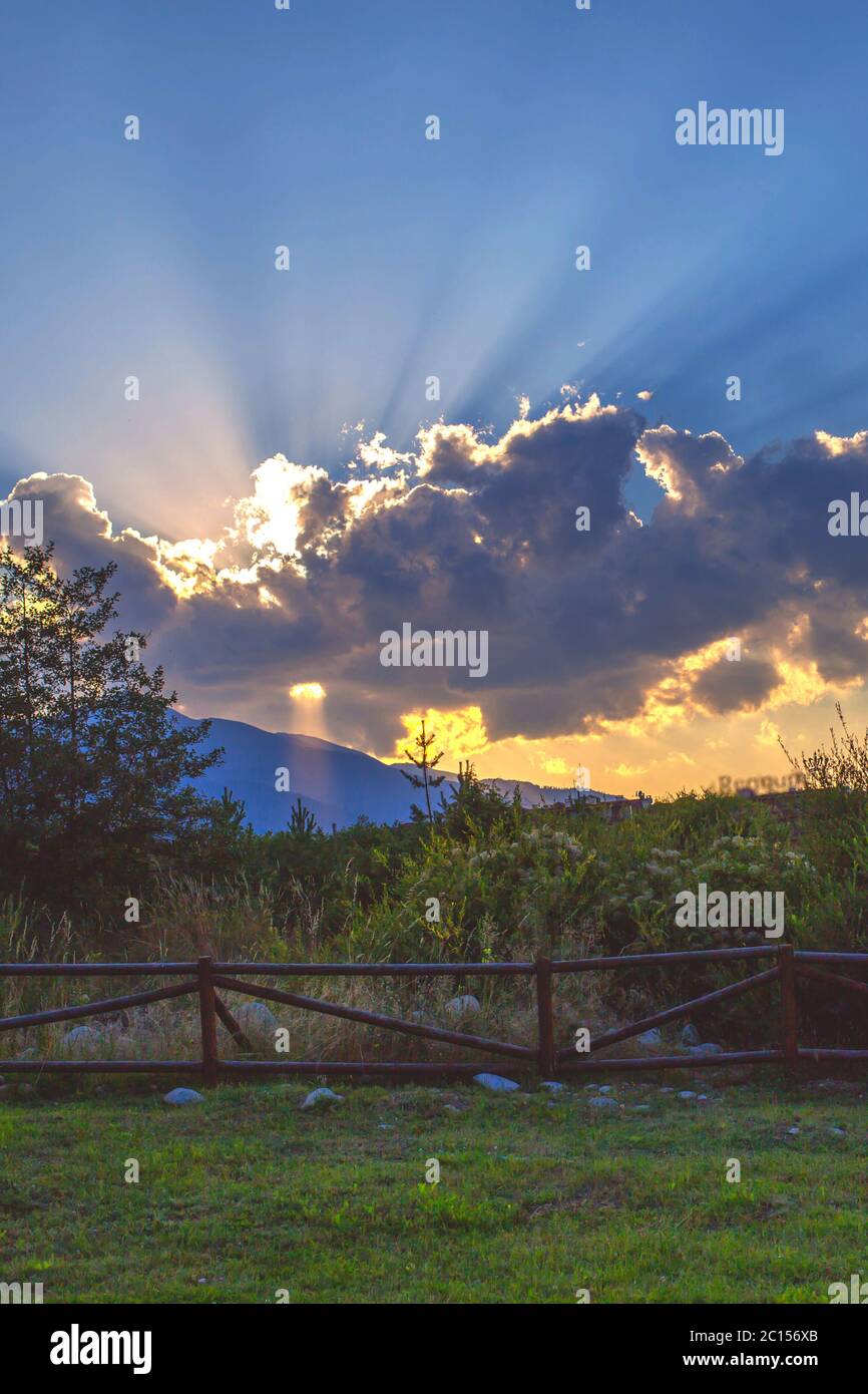 Sun beaming through clouds hi-res stock photography and images - Alamy