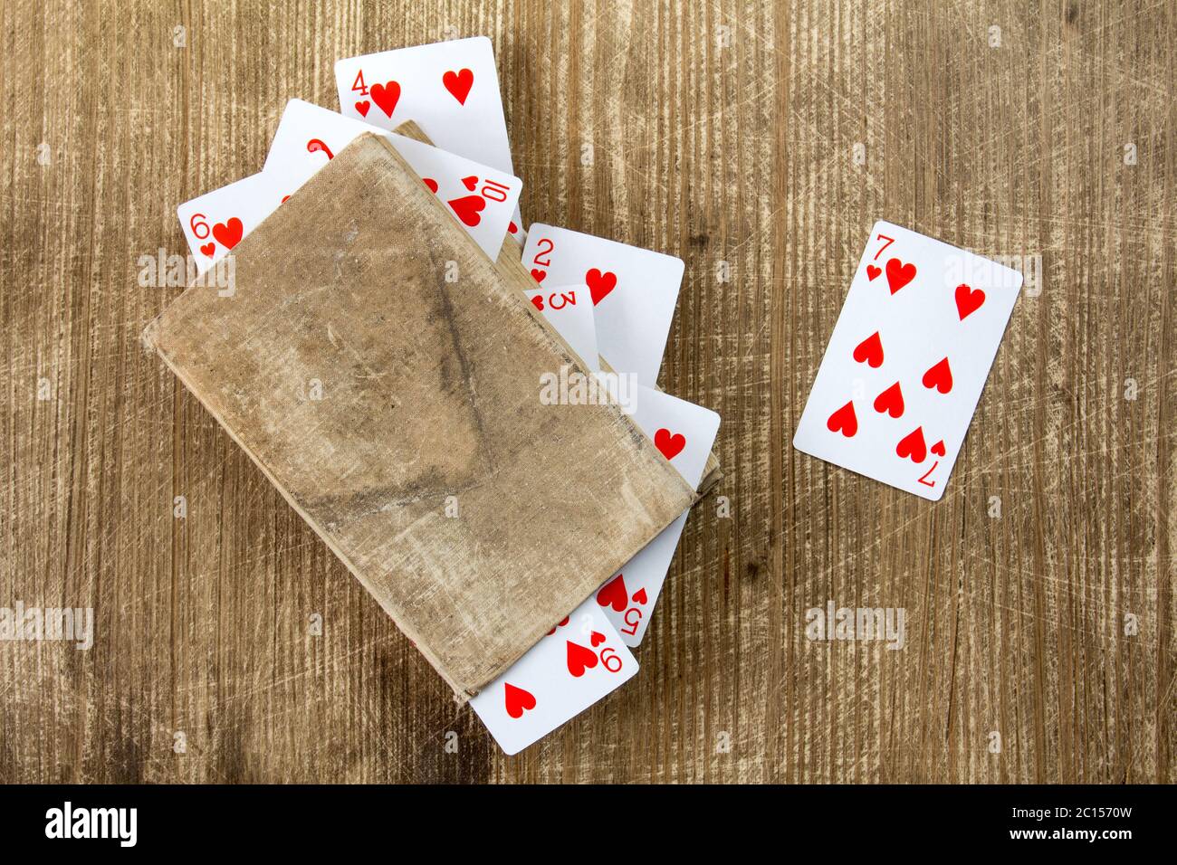 Old book and playing cards Stock Photo - Alamy