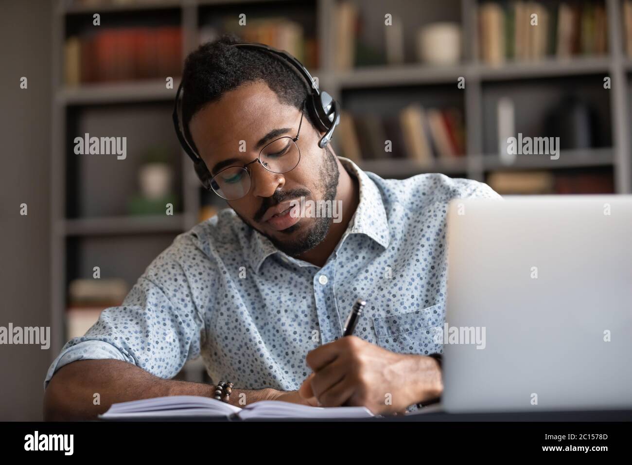 African student writing hi-res stock photography and images - Alamy