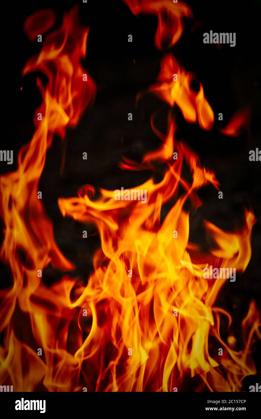 Very hot sizzling fire on black, campfire in the night Stock Photo - Alamy