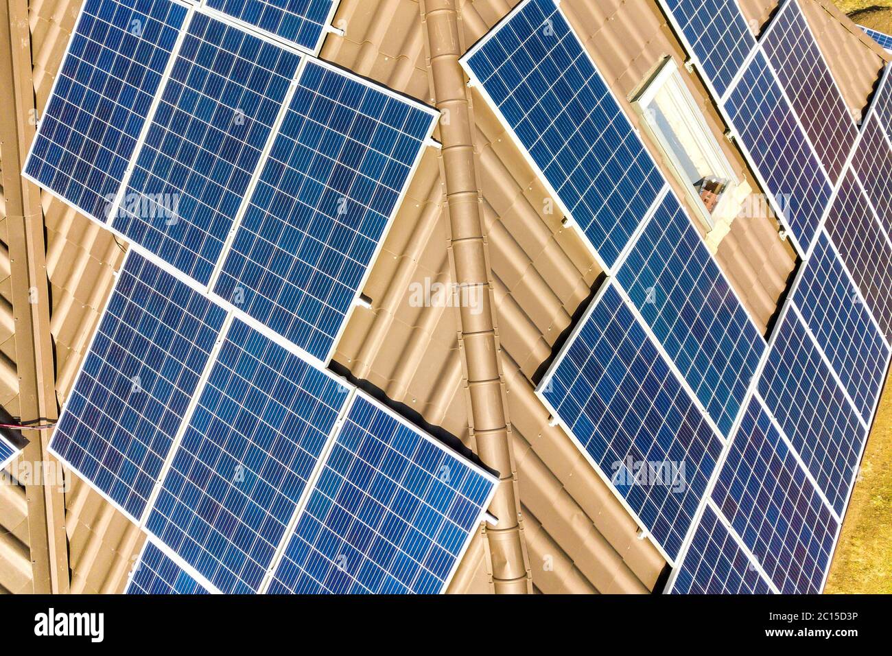 Aerial top view of new modern residential house cottage with blue shiny ...