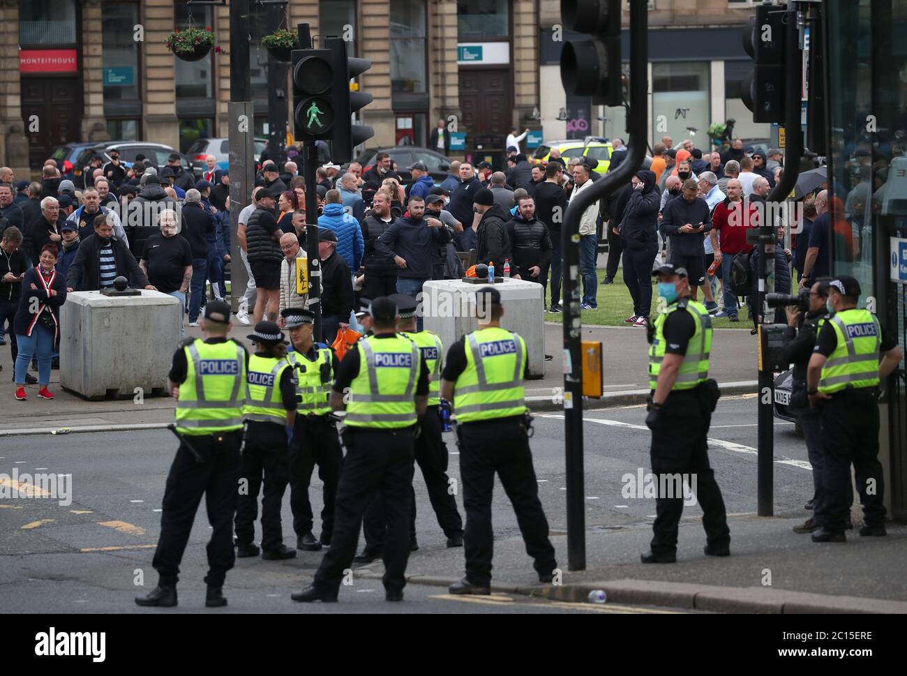 Police in Glasgow at a protest between people calling for the removal ...