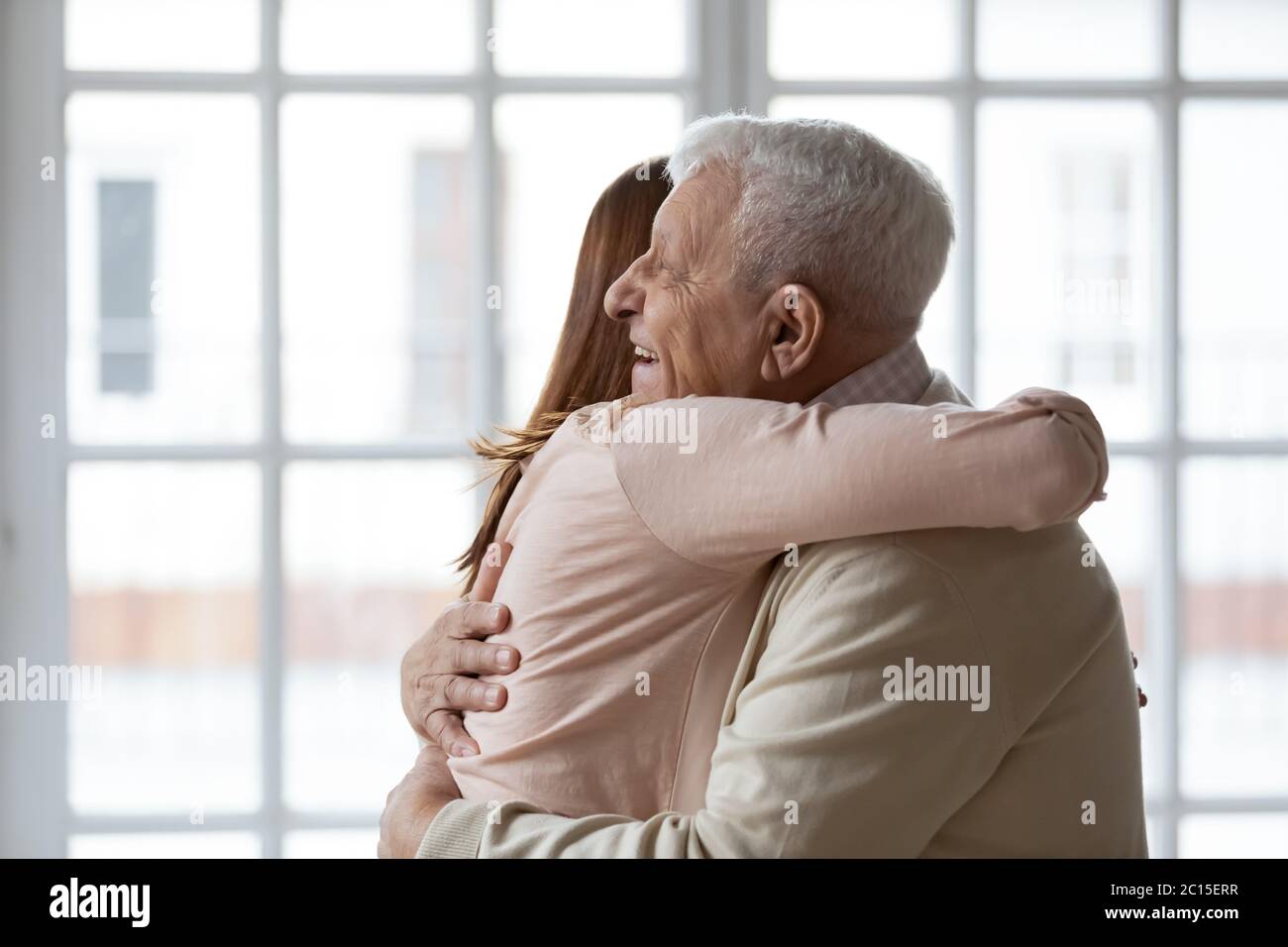 Close up happy older mature man hugging grownup daughter Stock Photo ...