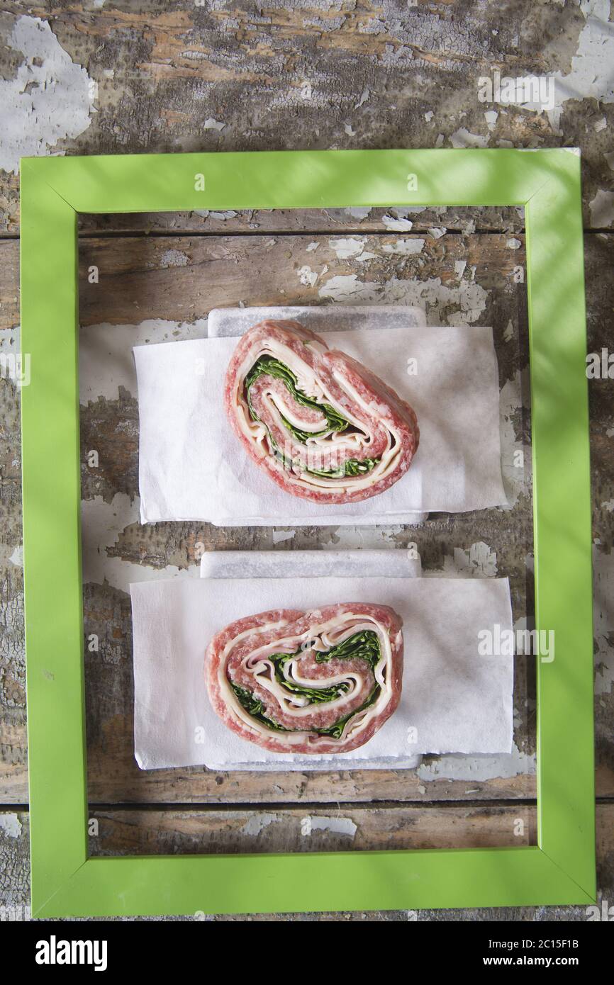 Roll of raw meat Stock Photo - Alamy
