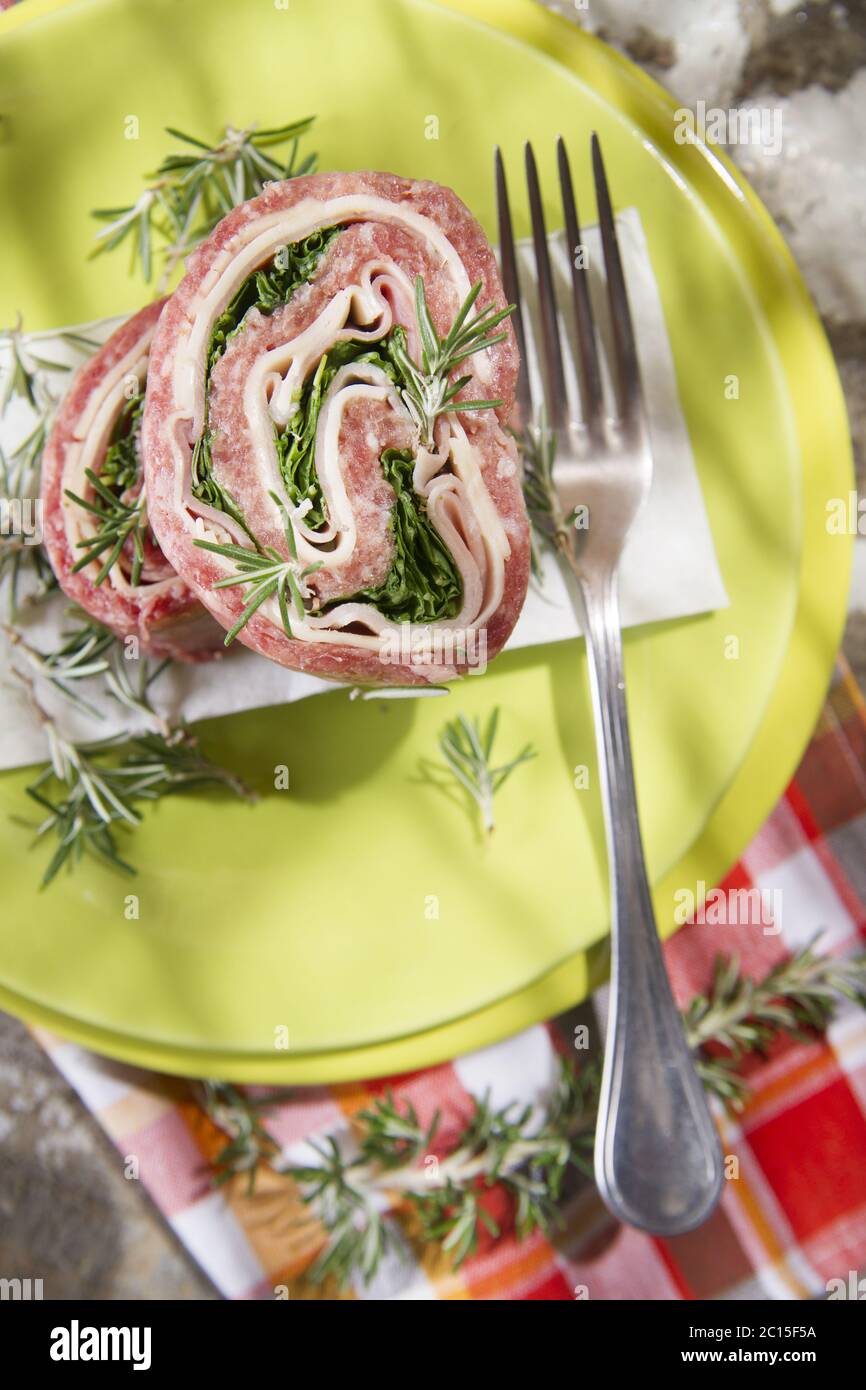 Roll of raw meat Stock Photo - Alamy