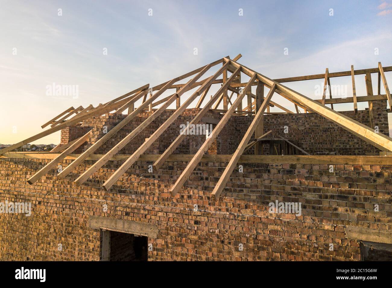 Private residential house with wooden roof frame structure under ...