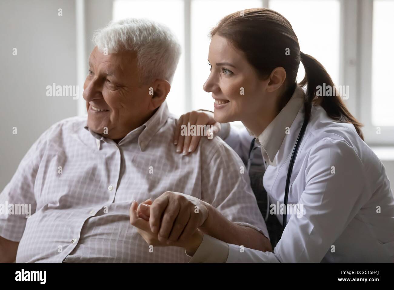 Caring nurse supporting patient hi-res stock photography and images - Alamy