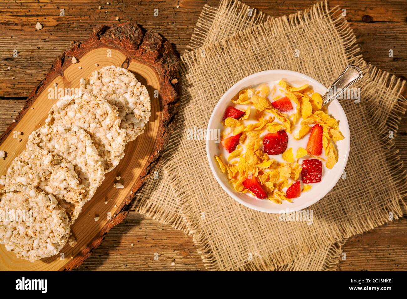 Continental breakfast with cornflakes, strawberries, rice crackers and ...