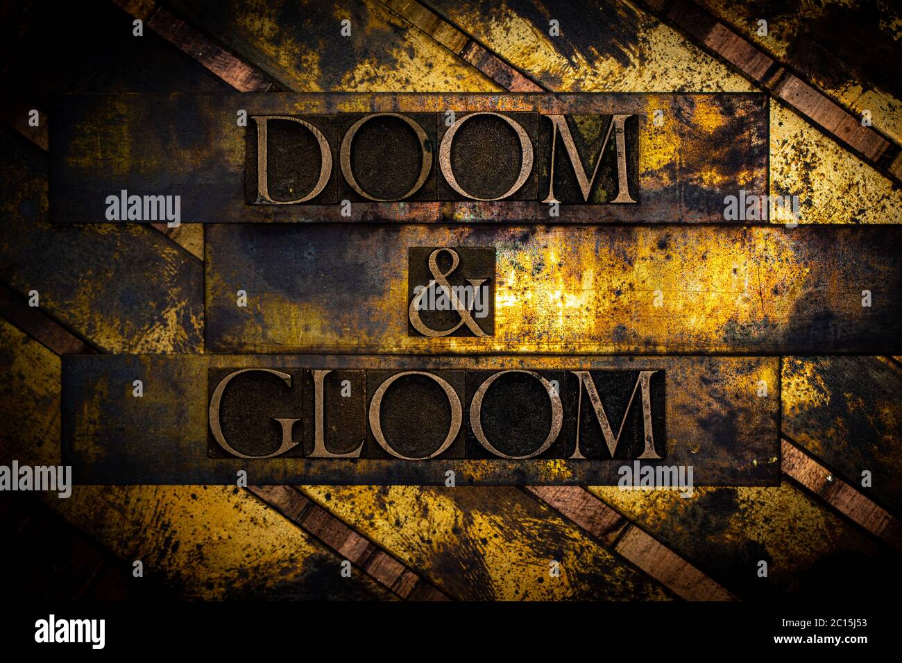 Doom and Gloom text formed with real authentic typeset letters on ...