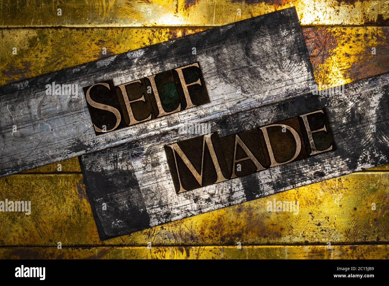 Self Made text formed with real authentic typeset letters on vintage ...