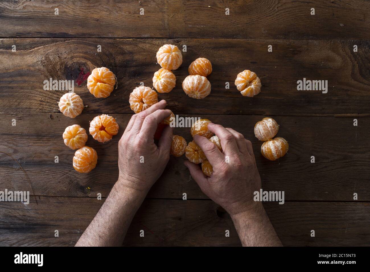 Small Mandarins peeled Stock Photo - Alamy
