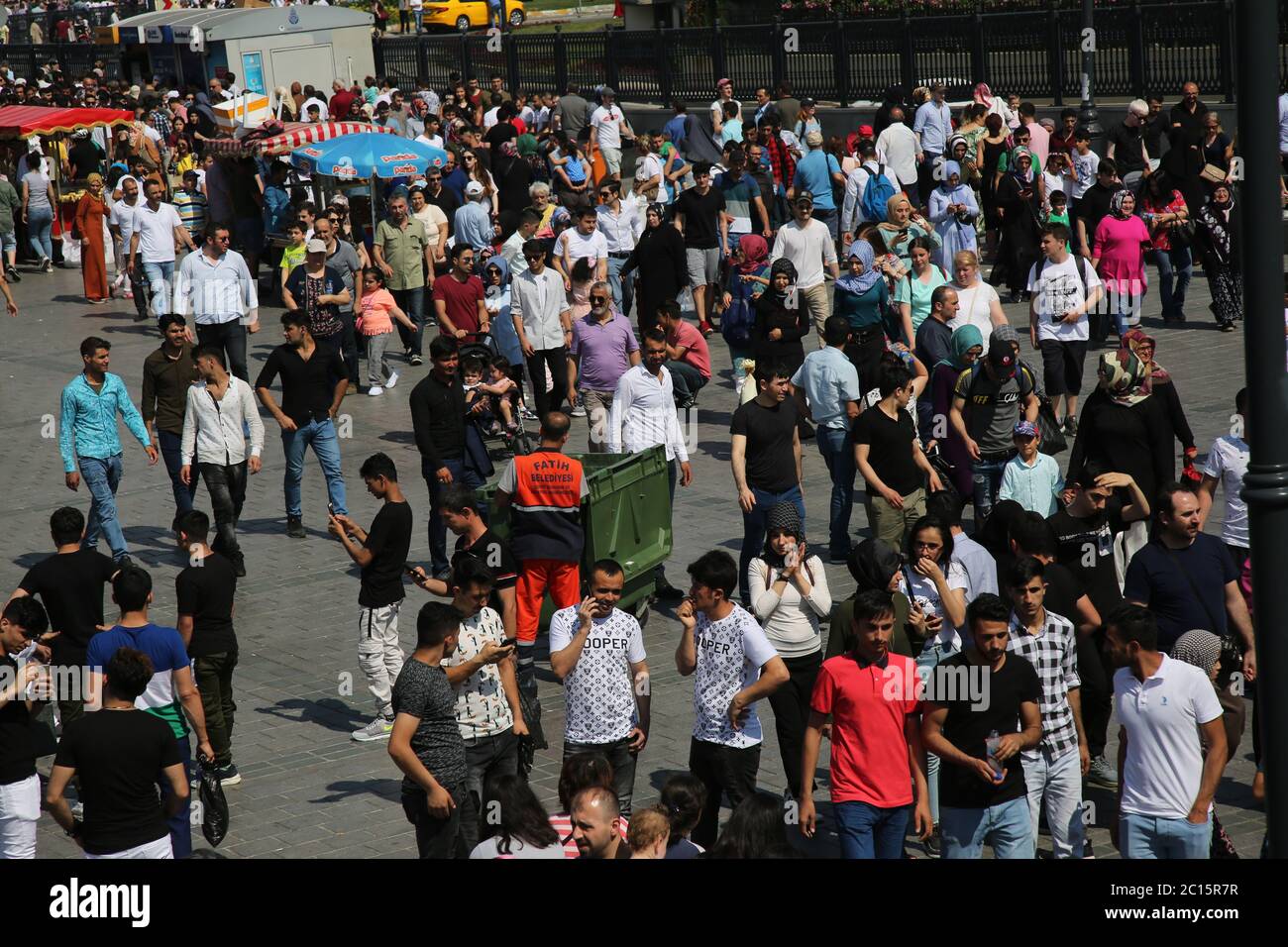 EMINONU, ISTANBUL, TURKEY; JUNE 26, 2018. People crowd walking through ...