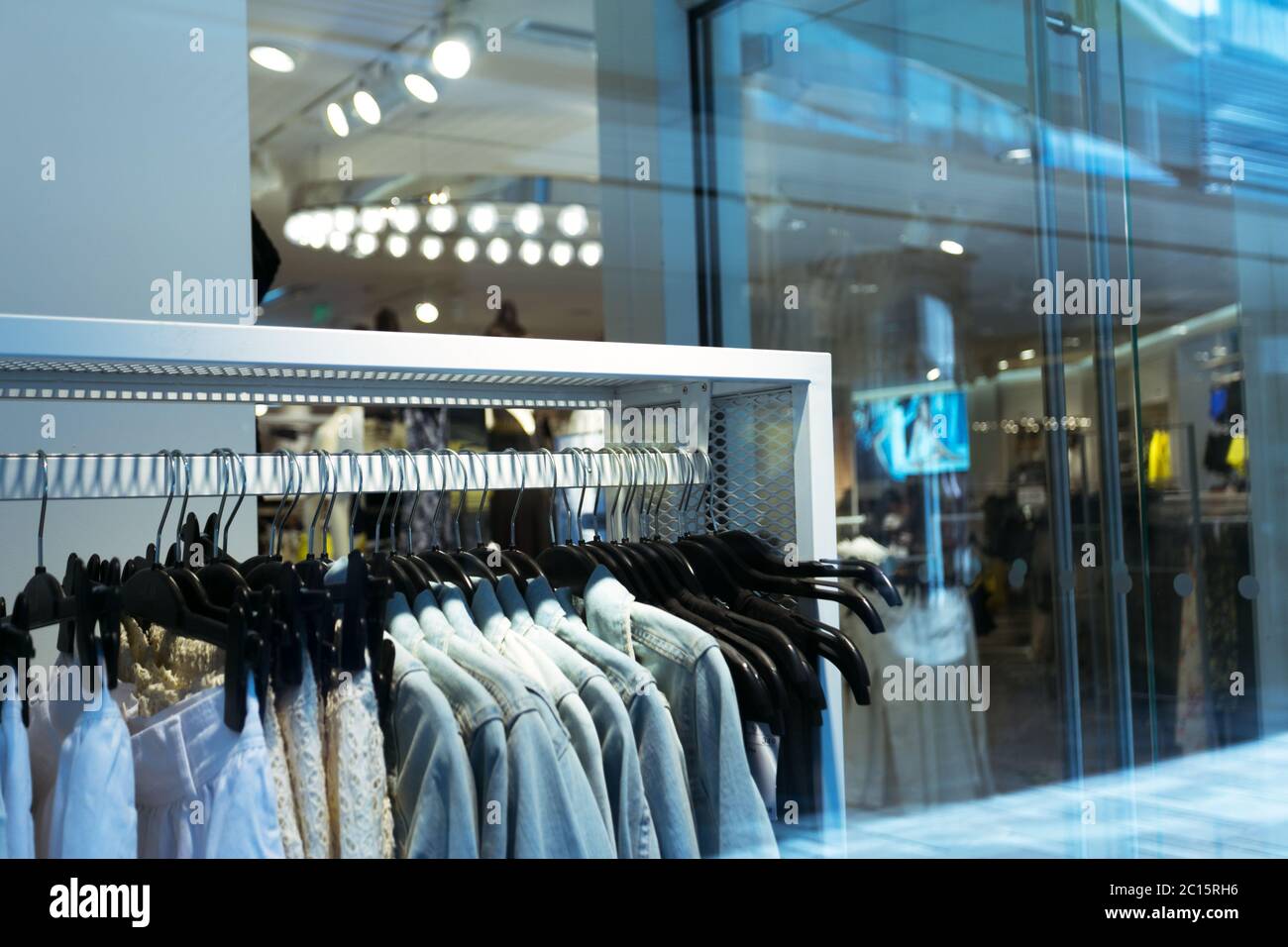 clothes in fashion store Stock Photo - Alamy