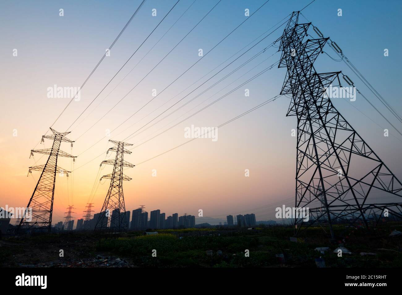 pylons in blue sky at sunrise Stock Photo - Alamy