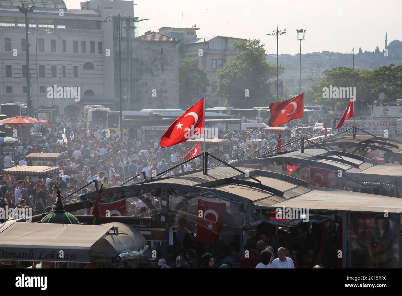 EMINONU, ISTANBUL, TURKEY; JUNE 26, 2018. People crowd walking through ...