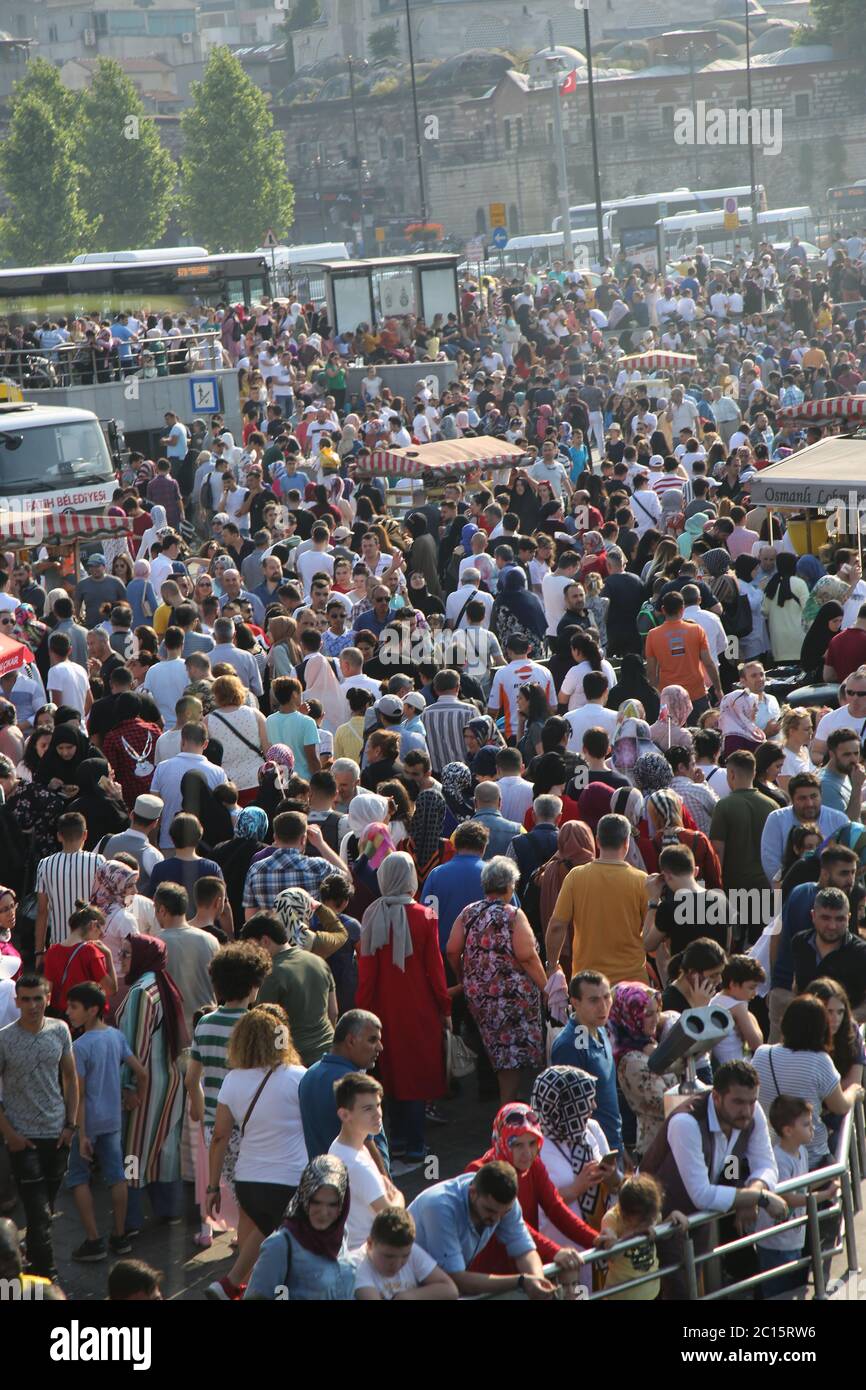 EMINONU, ISTANBUL, TURKEY; JUNE 26, 2018. People crowd walking through ...