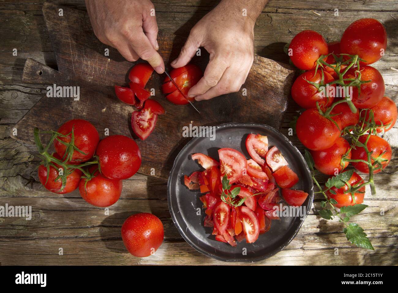 Red round smooth tomato Stock Photo - Alamy
