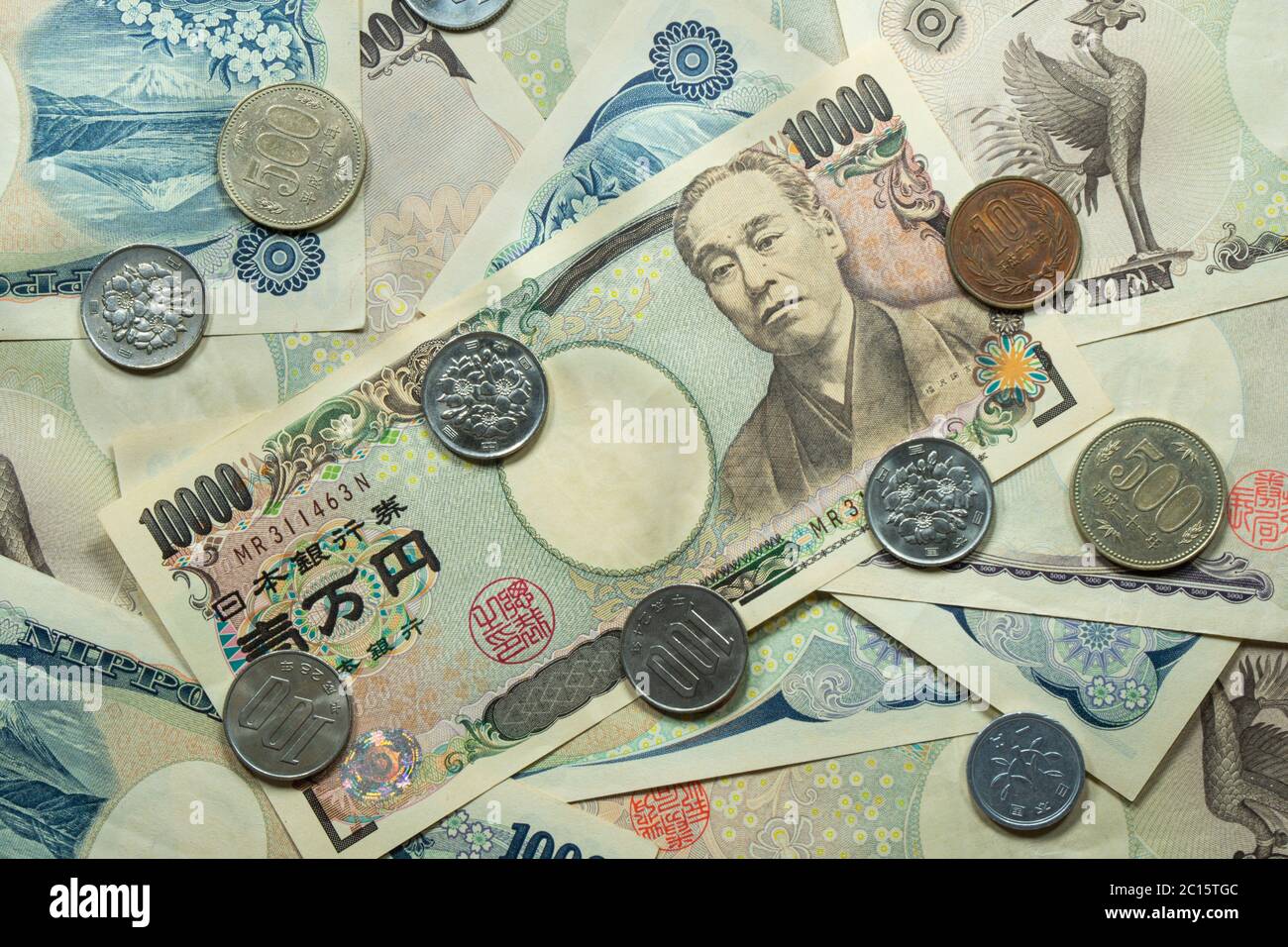 Japanese yen coins and banknotes. Yen are the official currency of ...