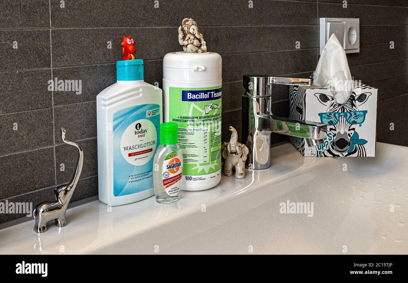 Bathroom basin with hand wash, disinfectant wipes , disinfectant hand ...
