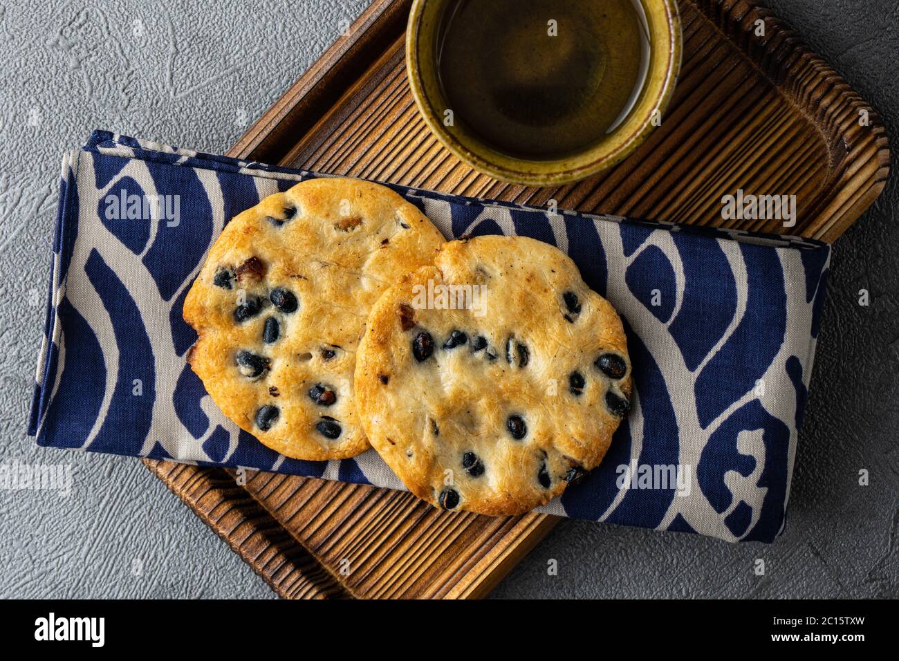 Senbei is a type of Japanese rice cracker, often served with green tea ...