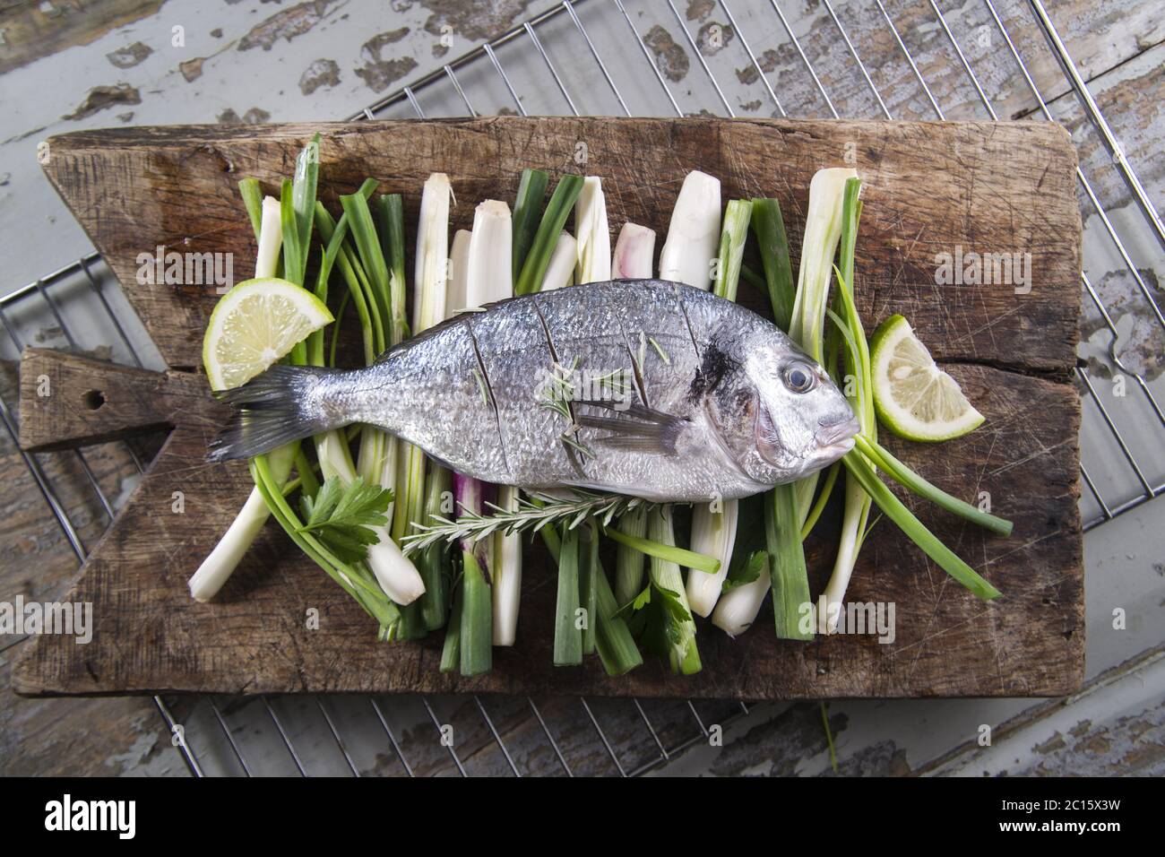 Raw sea bream Stock Photo - Alamy