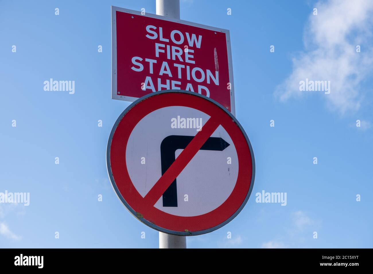signs warning of fire station ahead and no right turn inSaughall Massie ...