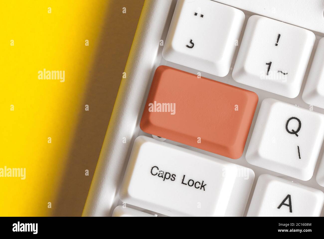 Different Colored Keyboard key With Accessories Arranged On Empty copy ...