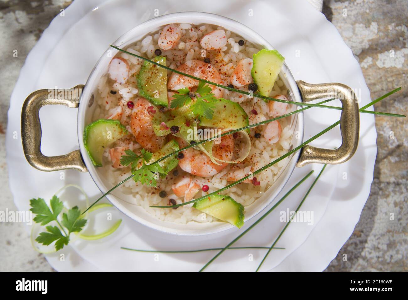 Rice with shrimp and zucchini Stock Photo - Alamy