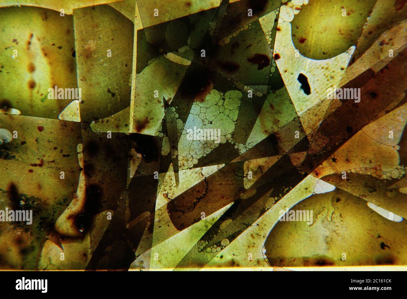 Colored liquids mixed together in fluid creating colorful abstract ...