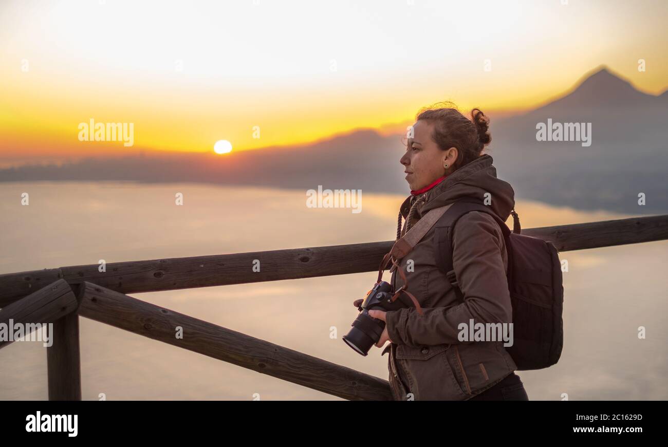 Female traveler photographing nature hi-res stock photography and ...