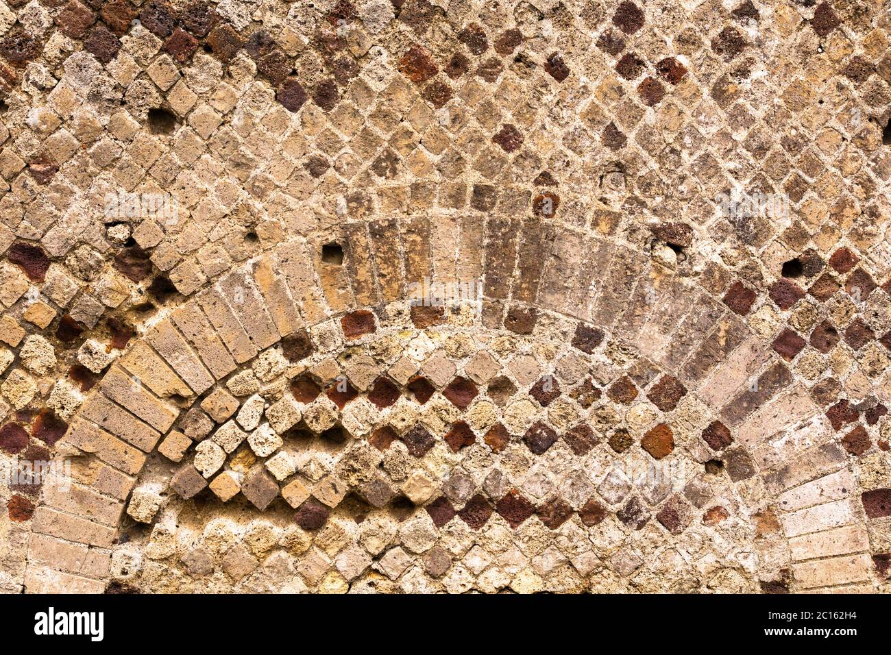 Decorative ancient Roman diagonal brick masonry wall construction ...