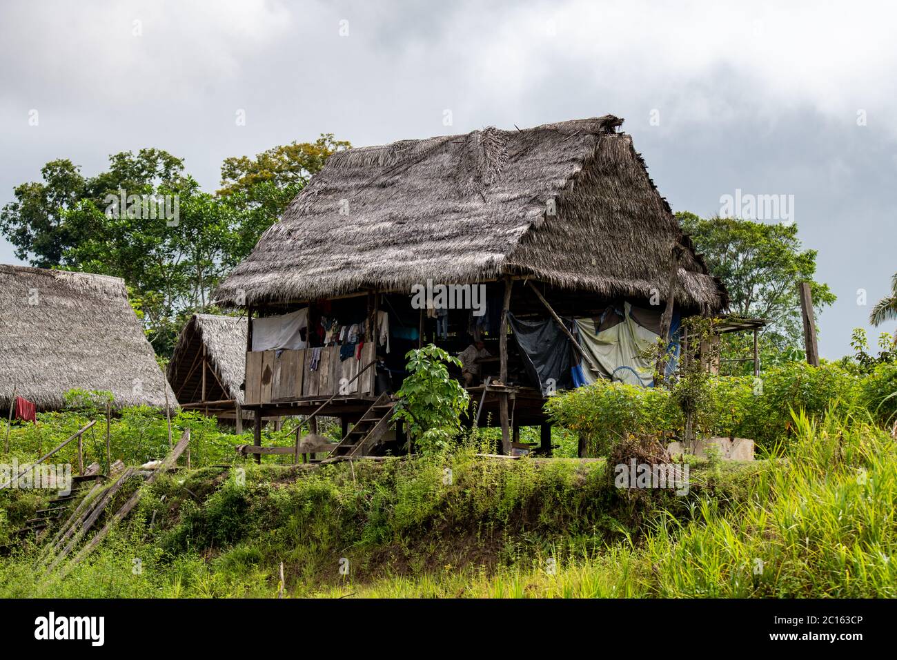 Wooden house on stilts is typical of the many Riberenos homes in the ...