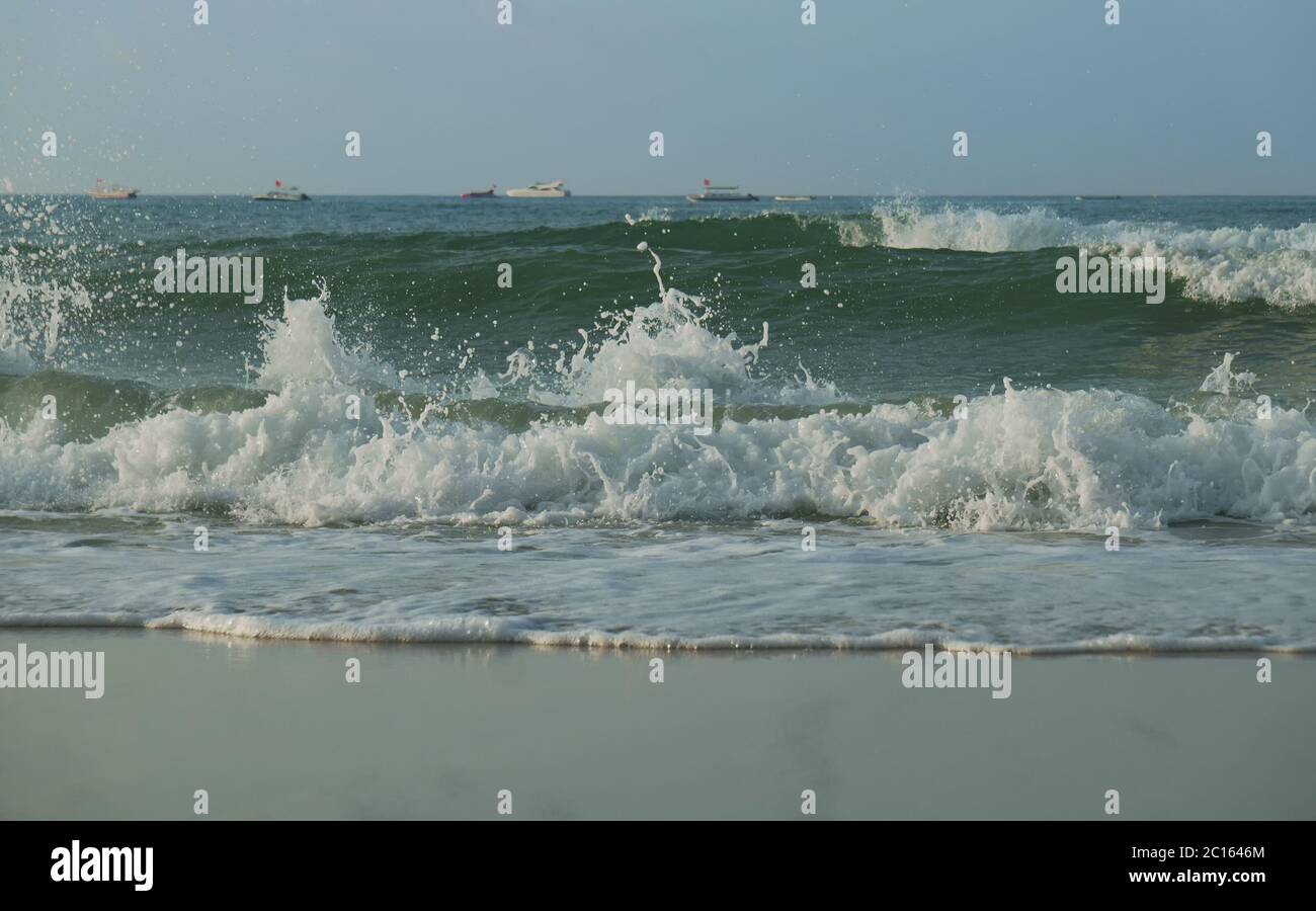 Beautiful waves of South China Sea on Dadonghai beach Stock Photo - Alamy