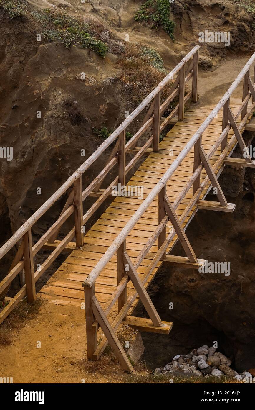 Small Wooden Bridge in a Cliff - Peniche, Portugal Stock Photo - Alamy